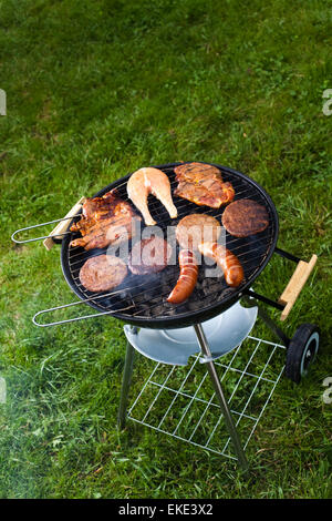 Barbecue a hot summer evening, Grilling Stock Photo - Alamy