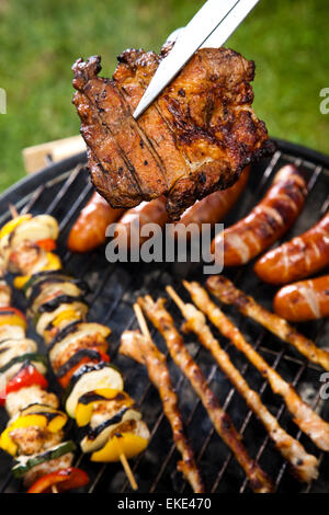 Barbecue a hot summer evening, Grilling Stock Photo - Alamy