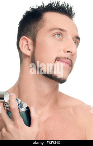 Young handsome man applying perfume Stock Photo - Alamy