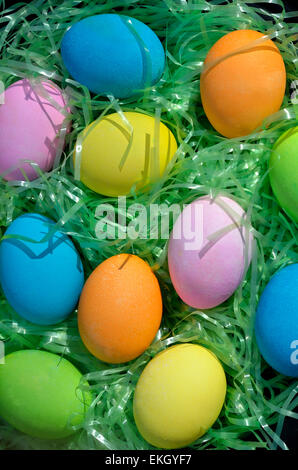 Kids craft. Painted blue and decorated with jewels and feathers paper ...