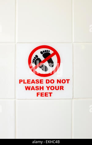 Sign "No washing of feet" in the toilet of the archaeological park in ...