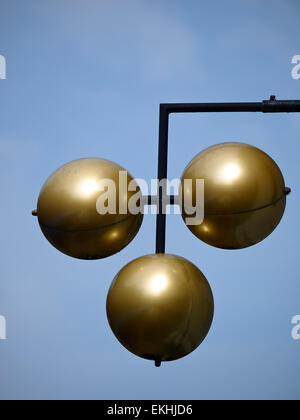 Pawn shop close up of traditional sign of three gold balls above ...
