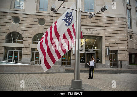 flags of U.S. Customs and Border Protection and USA painted on cracked ...