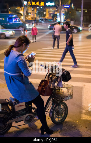 Woman use smart phone at night Stock Photo - Alamy