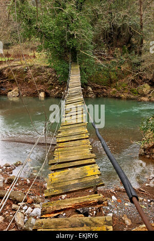 Suspended pedestrians' bridge over Kireas river, somewhere between ...