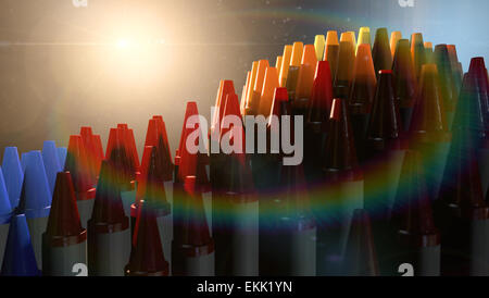 A spectrum of colorful wax crayons in a row on an isolated white ...