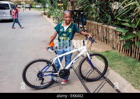 African Children riding bikes in a rural village in South Africa Stock ...