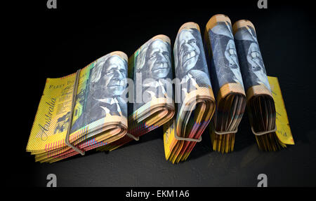 A close-up view of five wads of folded over stacks of indian rupee ...