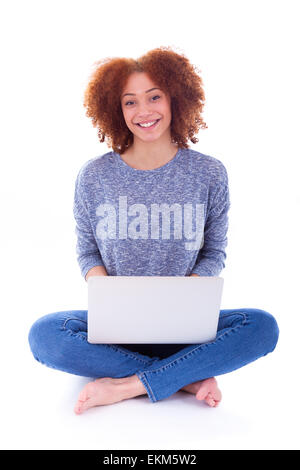 casual teenager with laptop. over white background Stock Photo - Alamy