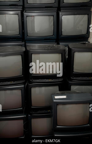 Many retro television. vintage old TV is colorful multi-row. Seeing the ...