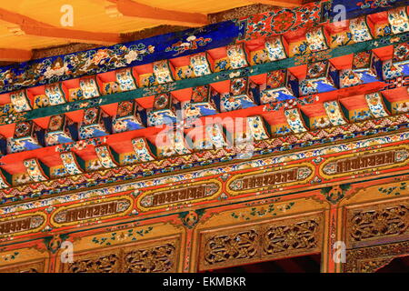 Colorist wood carved door lintel depicting tibetan traditional ...