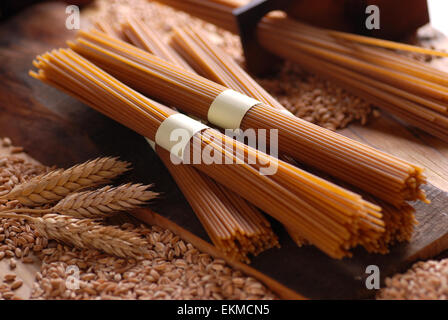 Organic wholemeal spaghetti - pasta extruded through bronze Stock Photo ...