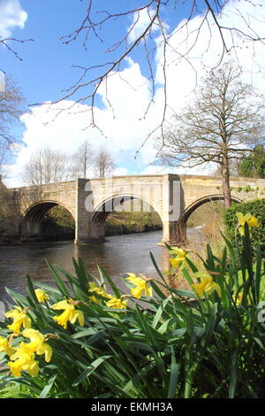 Baslow bridge in the village of Baslow in the Peak District Derbyshire ...