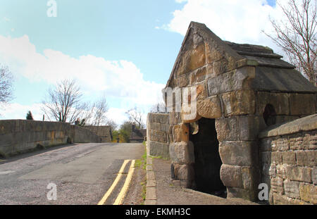 A toll booth on Bubnell Bridge, a listed stone bridge that spans the ...