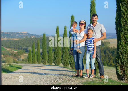 Happy family in Tuscan Stock Photo - Alamy