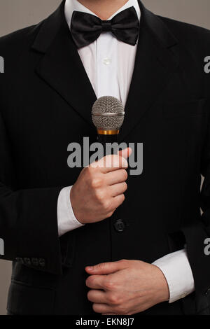 Master of ceremonies with microphone Stock Photo - Alamy