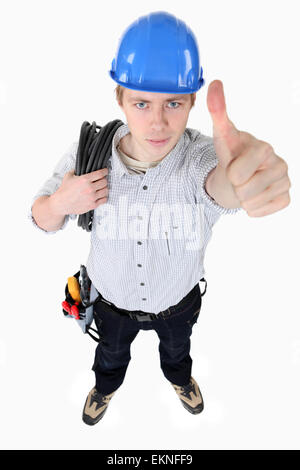 Successful electrician man giving thumb up isolated on white background ...