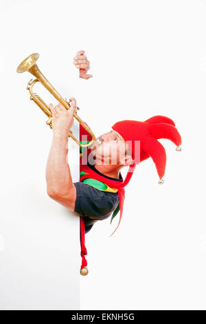 jester blowing trumpet Stock Photo - Alamy
