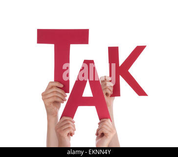 many hands holding the danish word Tak which means thanks Stock Photo ...