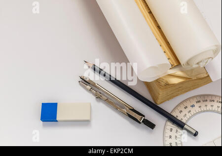 Ruler, compasses, eraser, pencil and tracing paper roll Stock Photo - Alamy