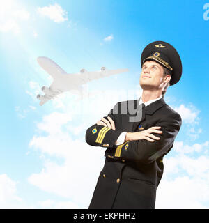 Image of male pilot with airplane at background Stock Photo - Alamy