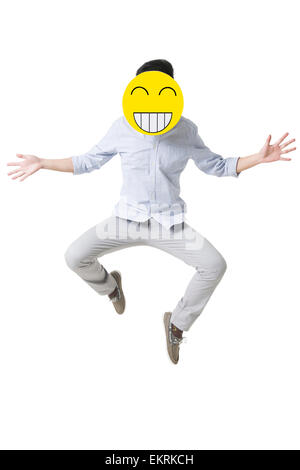 Happy emoji emoticon jumping in the air Stock Photo - Alamy