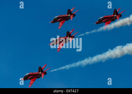 Red Arrows performing above Duxford Air Museum; Cambridgeshire, England ...