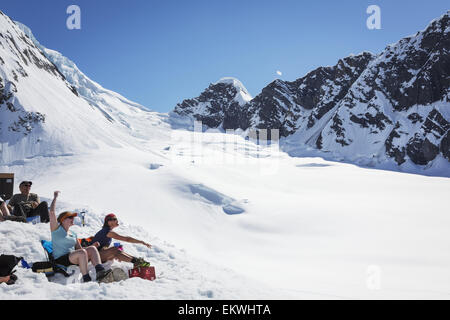 A group of visitors relaxing at the Don Sheldon Mountain House in the ...
