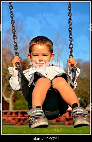 Cute boy 8 years old in adventure rope town Stock Photo - Alamy