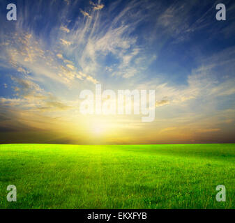 Beautiful sunset on the field in Őrség Hungary with sunbeams and bales ...