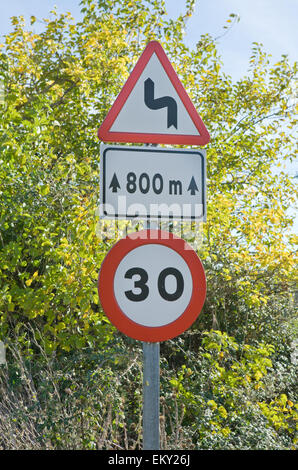 warning traffic sign sharp right curve Stock Photo - Alamy