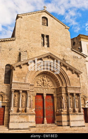 Portal with tympanum of the Romanesque St-Trophime Cathedral, Place de ...