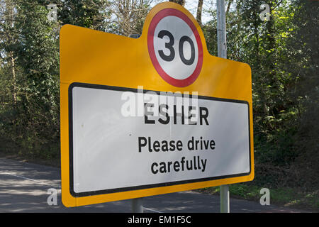 esher please drive carefully road sign with 30mph speed limit notice ...