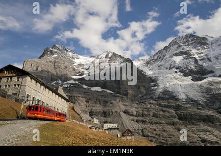 Jungfraujoch Railway Train Passing Eigergletscher Station with Eiger ...
