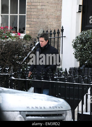 Hugh Grant Actor leaving his London home Stock Photo - Alamy