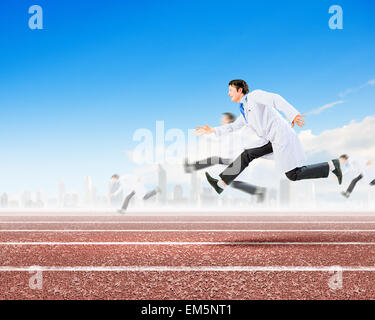 Image of funny doctors running at stadium Stock Photo - Alamy