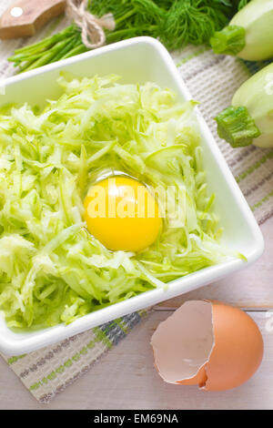 Grated marrow with eggs Stock Photo - Alamy