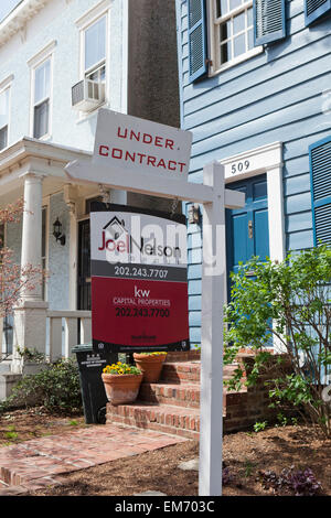 Under Contract sign on top of real estate sale sign - Washington, DC ...