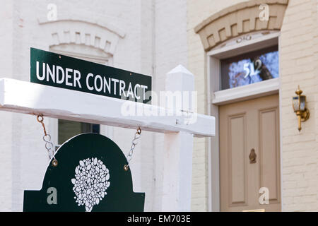 Under Contract sign on top of real estate sale sign - Washington, DC ...