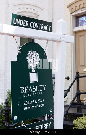Under Contract sign on top of real estate sale sign - Washington, DC ...