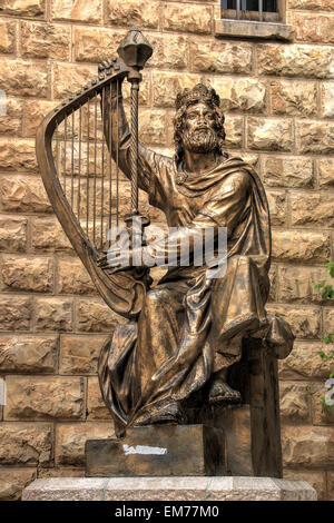 Bronze sculpture of David, a Jewish king ( old testament era ) in the ...