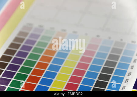 Close-up of a a cmyk test print with many color squares. Side view ...