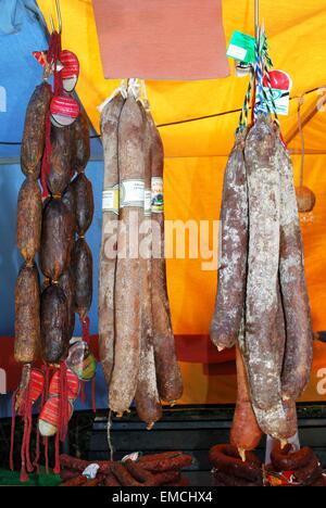 medieval meat and sausage market stall on a sand area - isolated on ...
