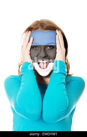 Human face painted with flag of Estonia Stock Photo - Alamy