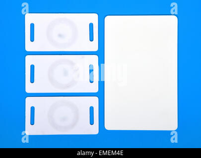 white RFID cards on a blue background Stock Photo - Alamy