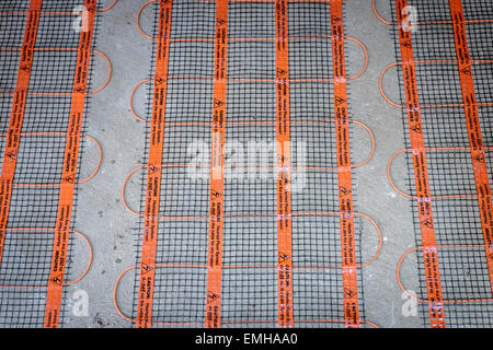 Underfloor heating mat installation; Meshed support and heating Stock ...