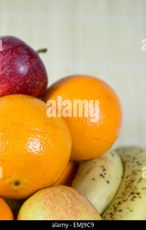 Fruit bowl with bananas, oranges, apples, lemon and pear Stock Photo ...