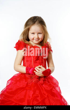 Cute little princess dressed in red dancing. Isolated on white ...