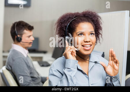 call center agent speaking with costumer Stock Photo - Alamy