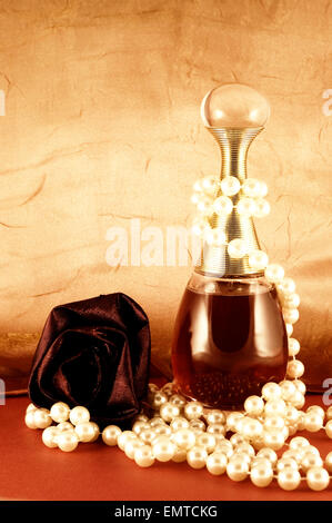 Beautiful woman with pearls and still life Stock Photo - Alamy